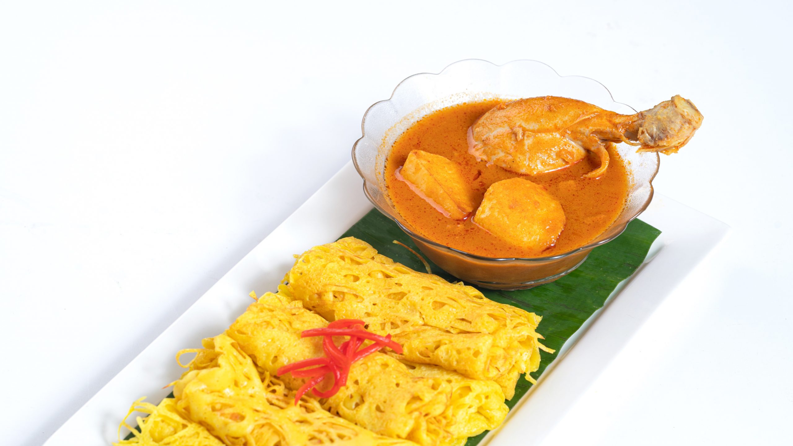 U.S. Potato Roti Jala with Chicken Curry - Potatoes USA