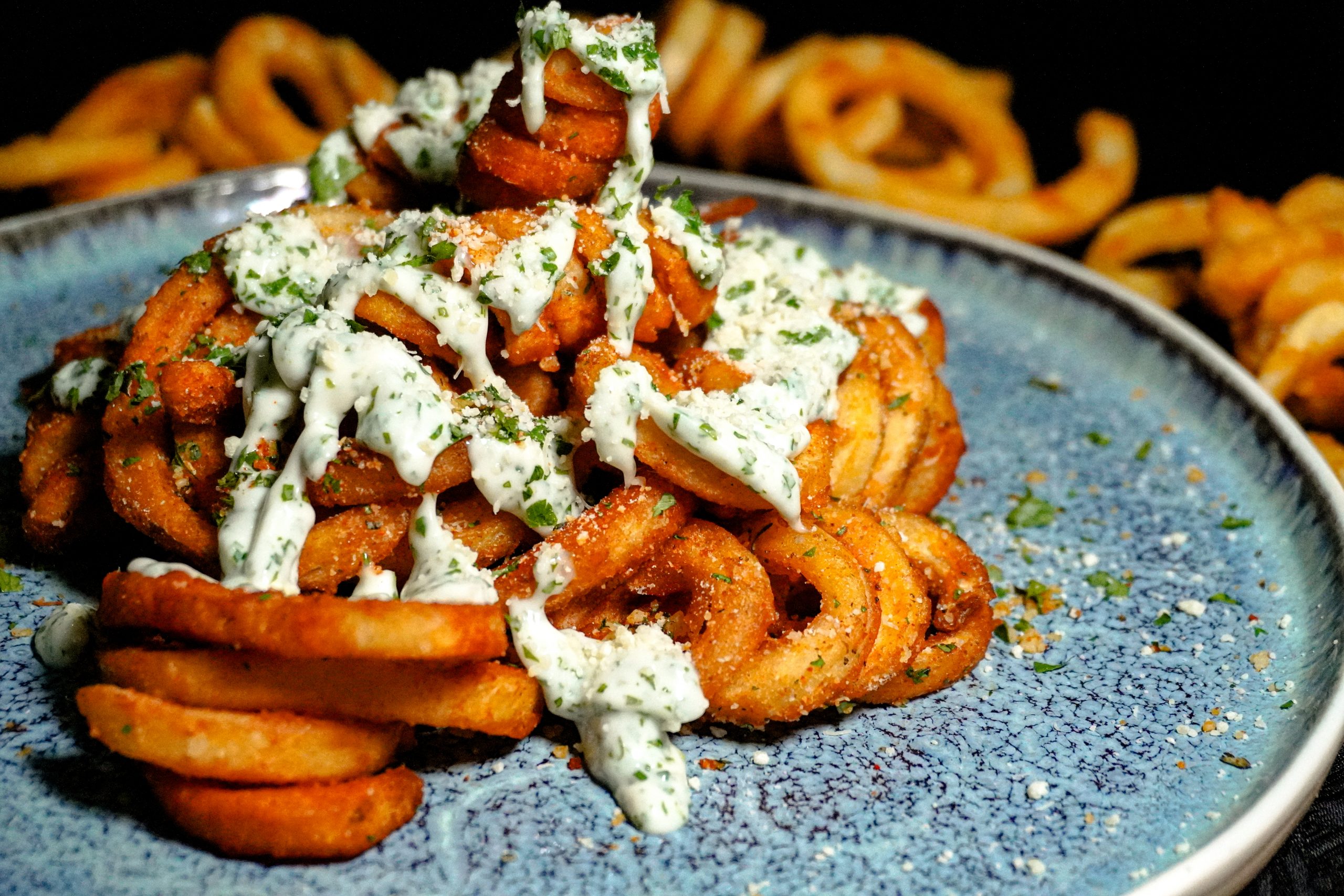 Spicy Loaded U.S. Curly Fries - Potatoes USA